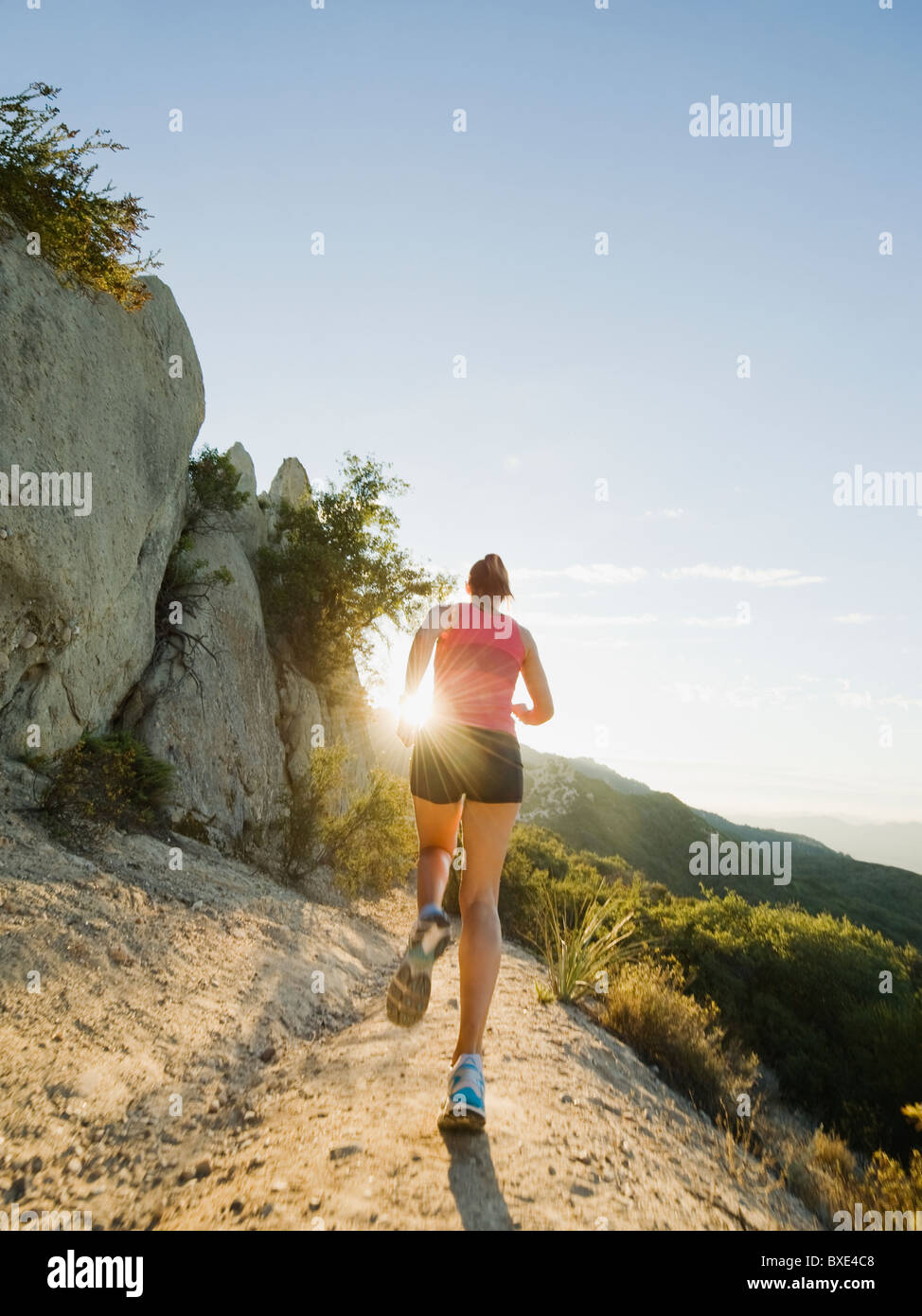 Female runner back low angle hi-res stock photography and images - Alamy
