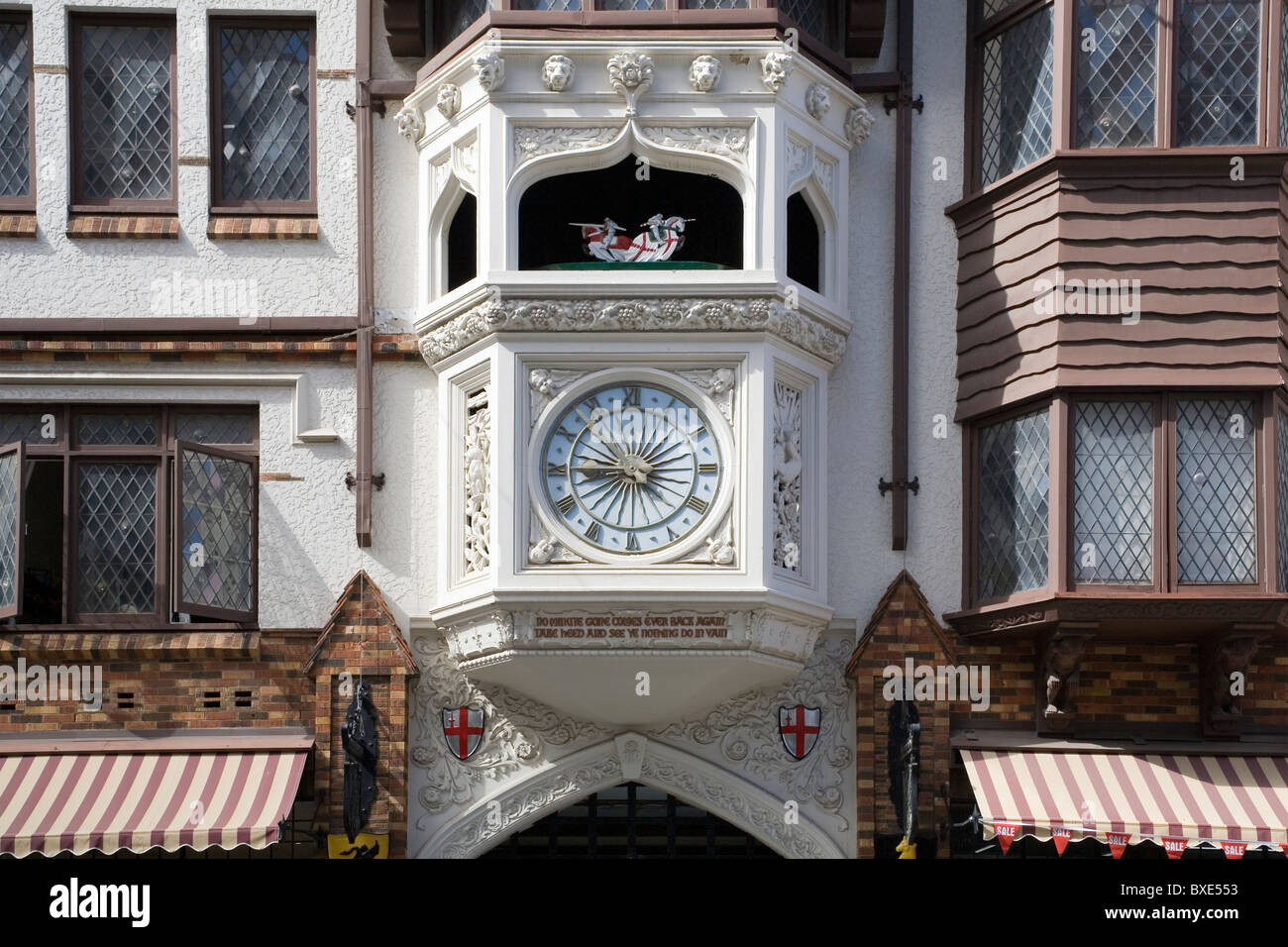 Old style clock at the entrance to the Old London Court shopping arcade ...