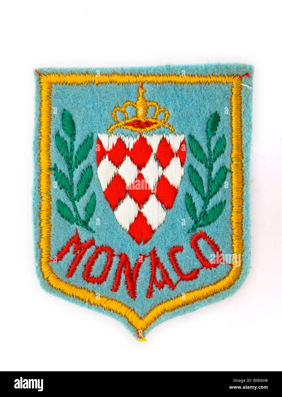Embroidered cloth badge, or patch, depicting Monaco. Shield shape. From about 1964 Stock Photo ...