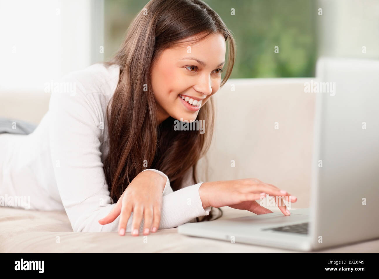 Woman browsing the internet Stock Photo - Alamy