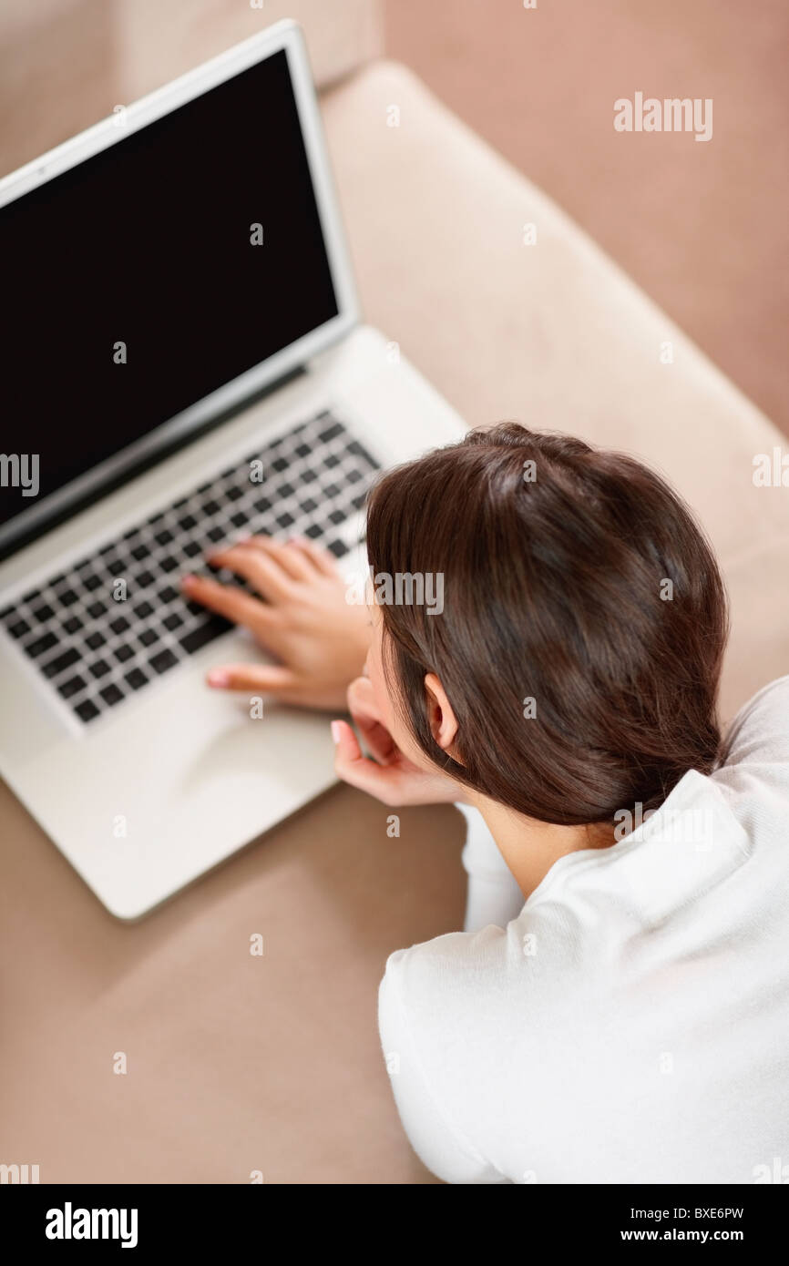 Woman browsing the internet Stock Photo - Alamy