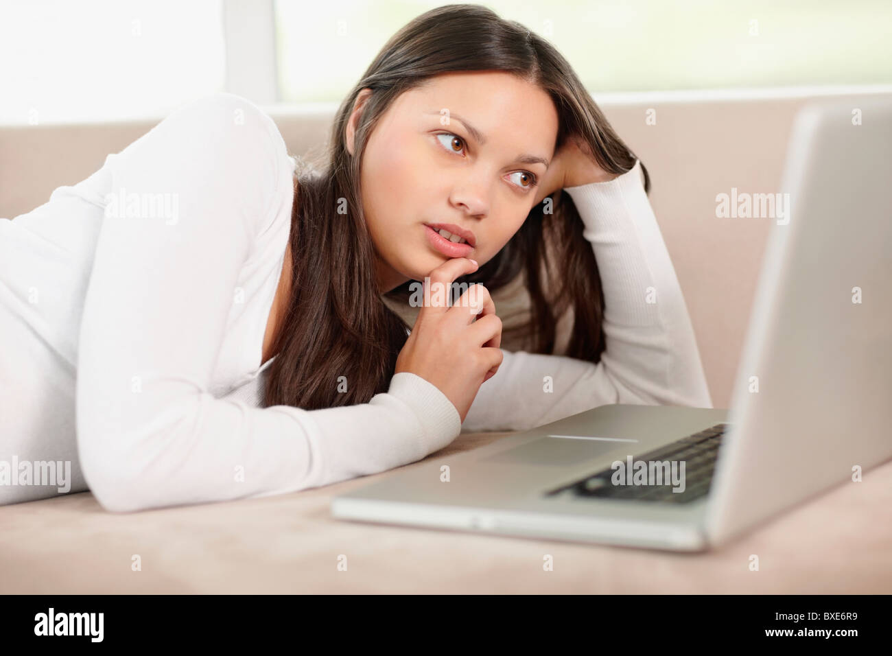Woman browsing the internet Stock Photo - Alamy