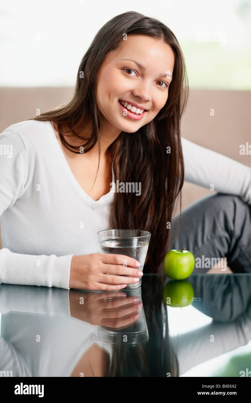 Woman having a healthy snack Stock Photo - Alamy