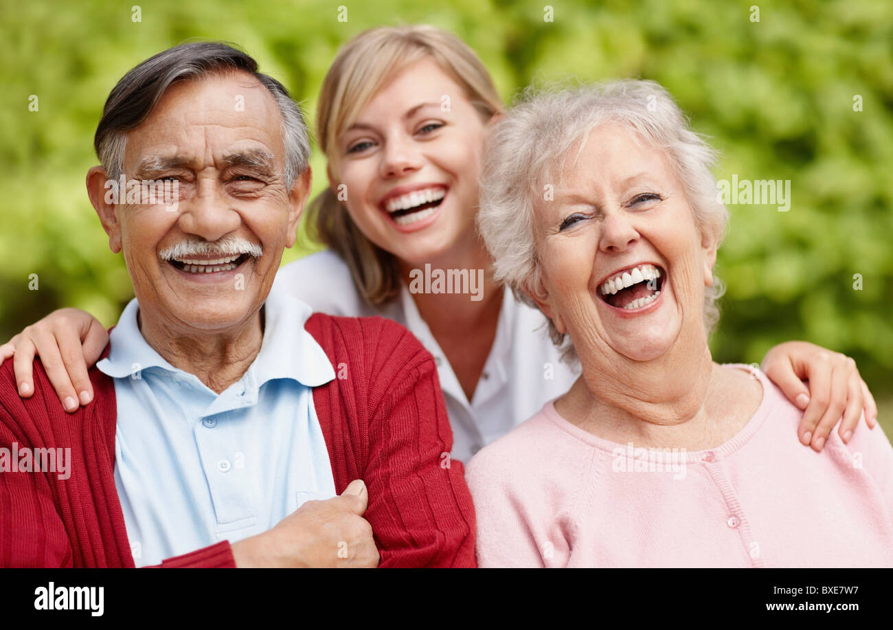 three people laughing Stock Photo - Alamy