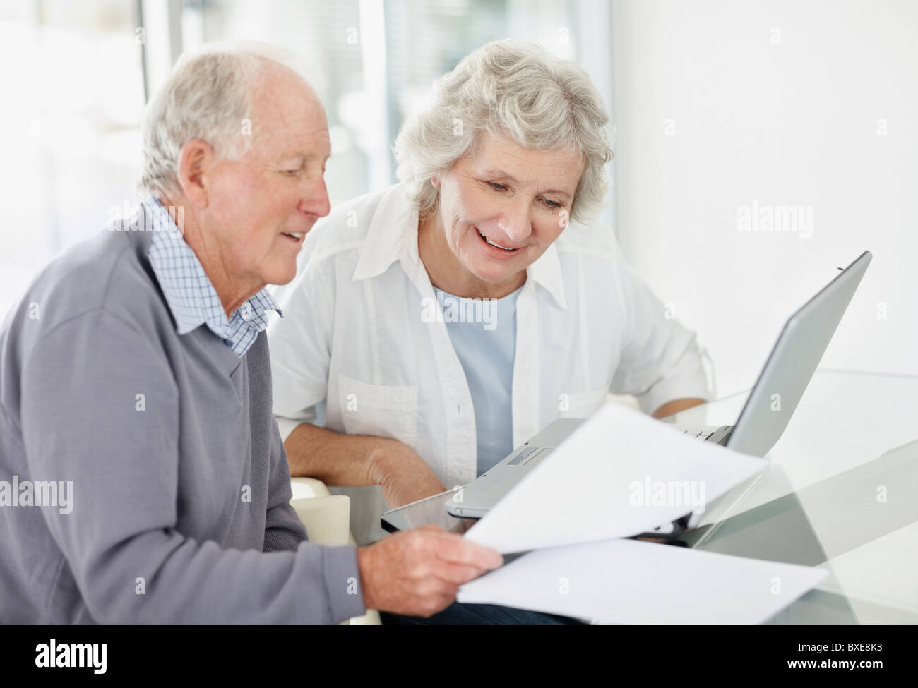Seniors couple paperwork hi-res stock photography and images - Alamy