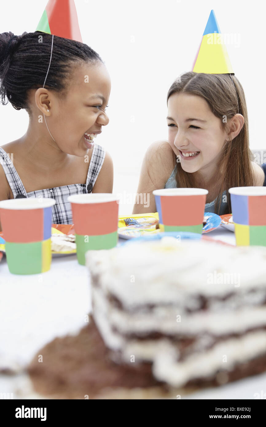 Two girls at a birthday party Stock Photo - Alamy