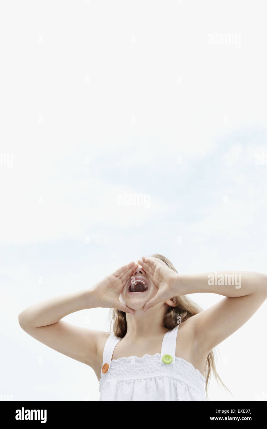 Young girl shouting Stock Photo - Alamy