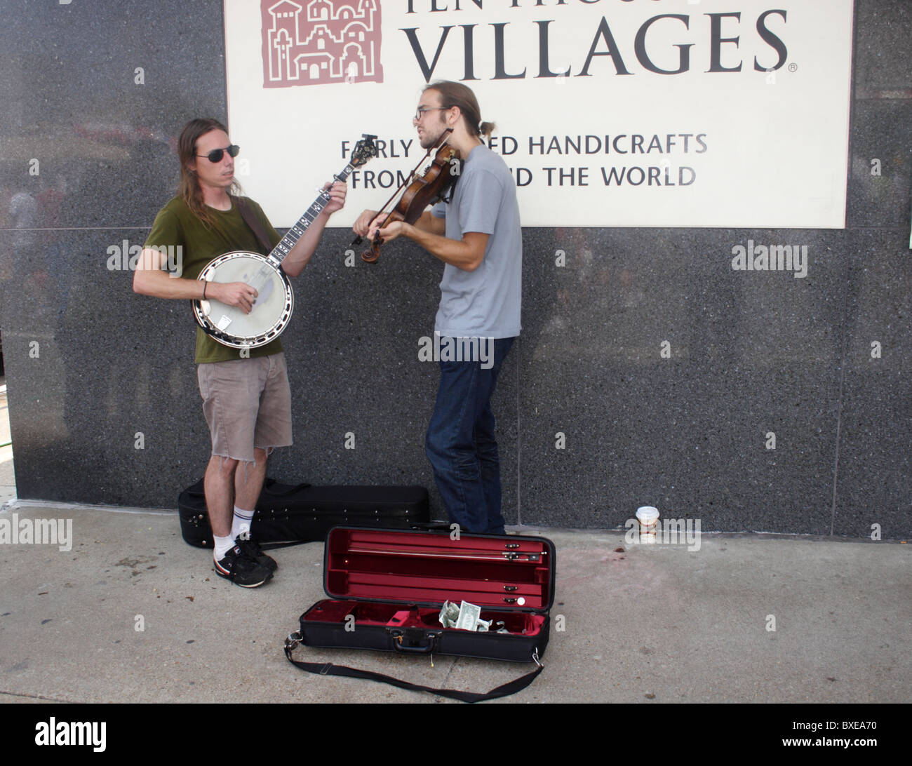 Two young street musicians performing in Richmond, Virginia Stock Photo ...