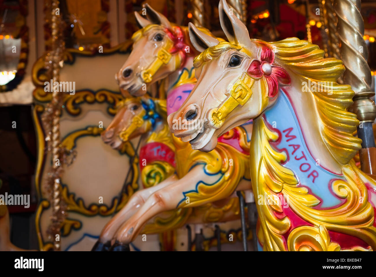 Children on a merry go round at a fun fair hi-res stock photography and ...