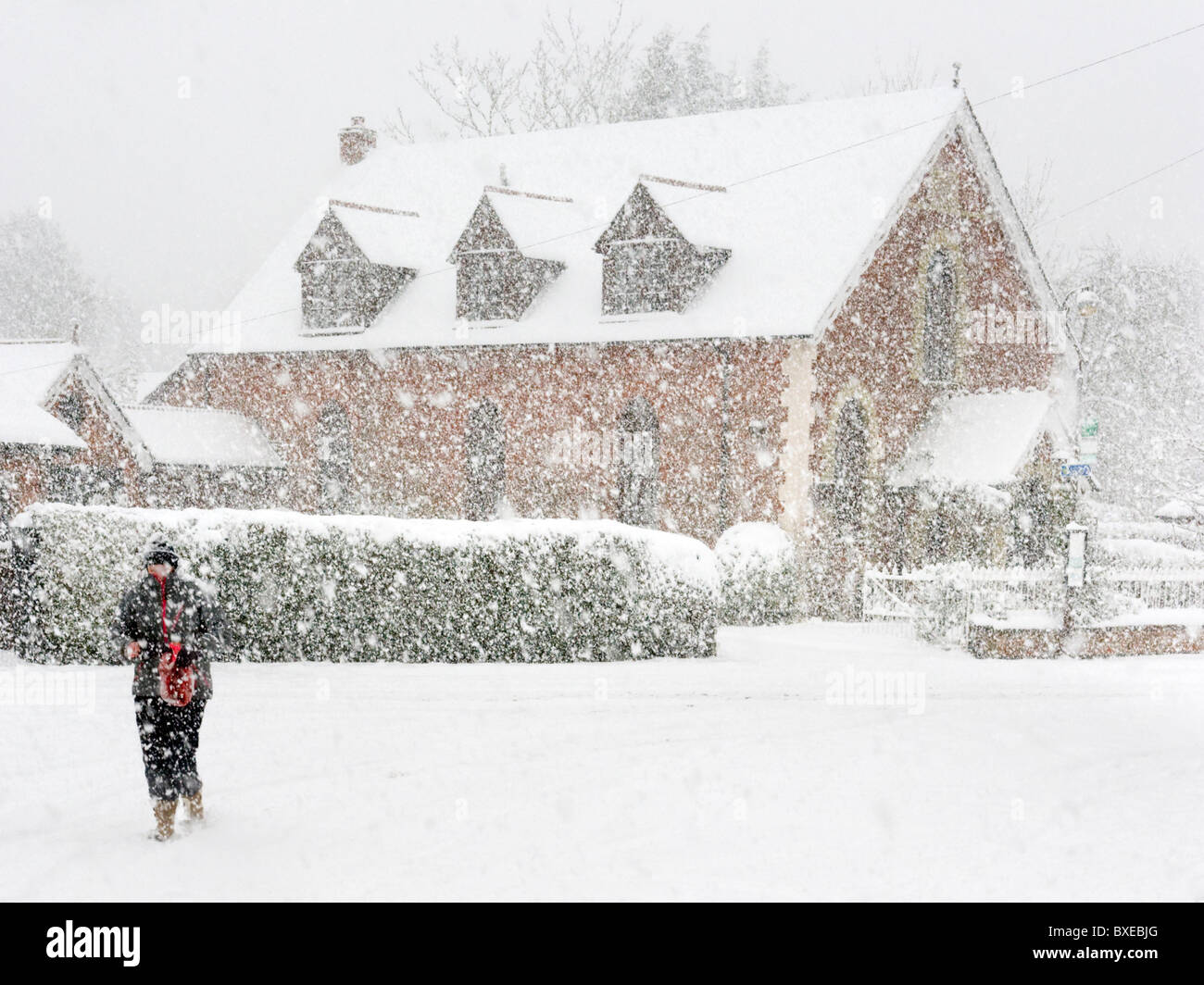 Falling heavy snow and blizzard conditions in the rural village of Seer ...