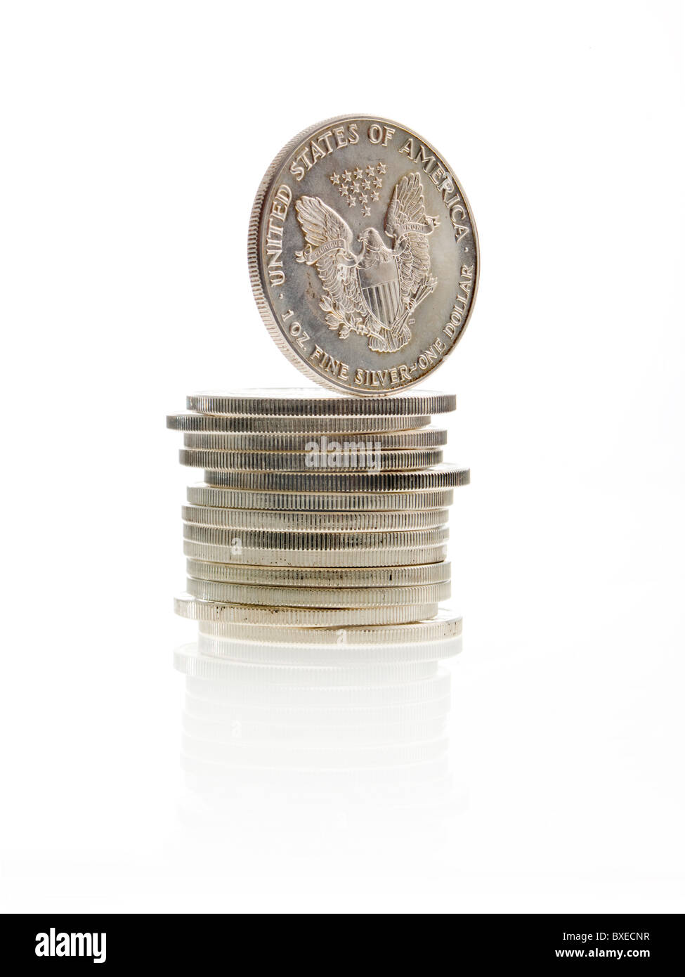 Stack of silver dollars Stock Photo - Alamy