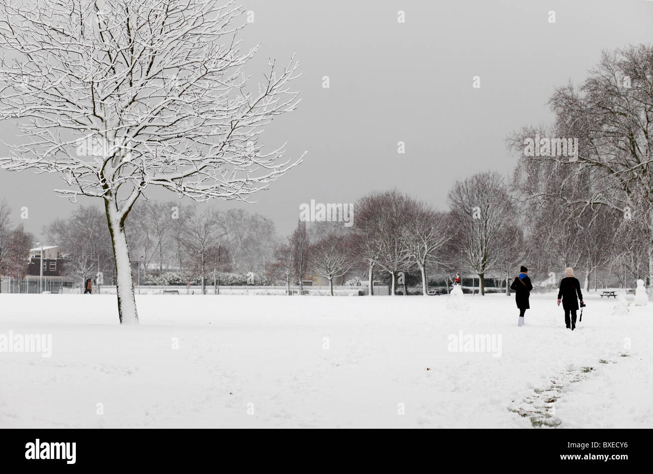 people walking in distance Stock Photo - Alamy