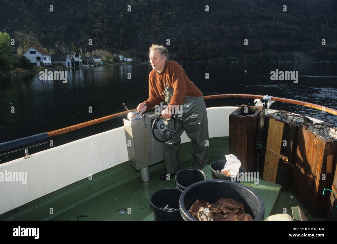Angling from boat, crab, lobster, Old man fishing Stock Photo - Alamy