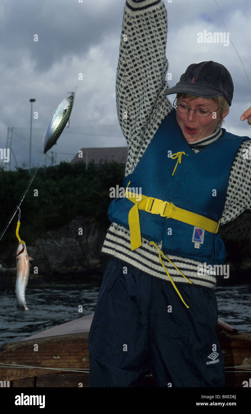 Women fishing from boat, fish, cod, mackerel, Women with fish from the ...