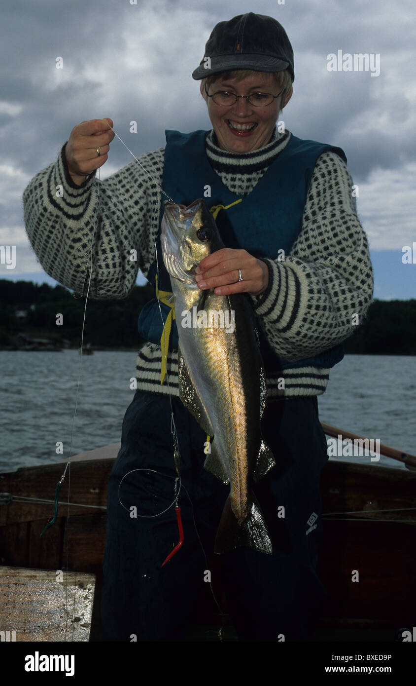 Women fishing from boat, fish, cod, mackerel, Women with fish from the ...