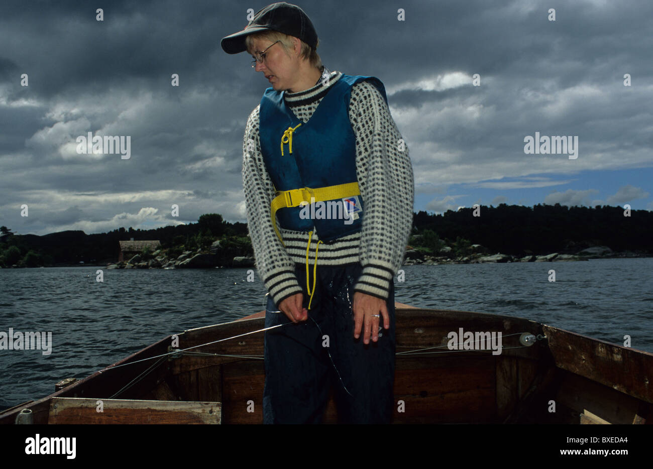 Women fishing from boat, fish, cod, mackerel, Women with fish from the ...