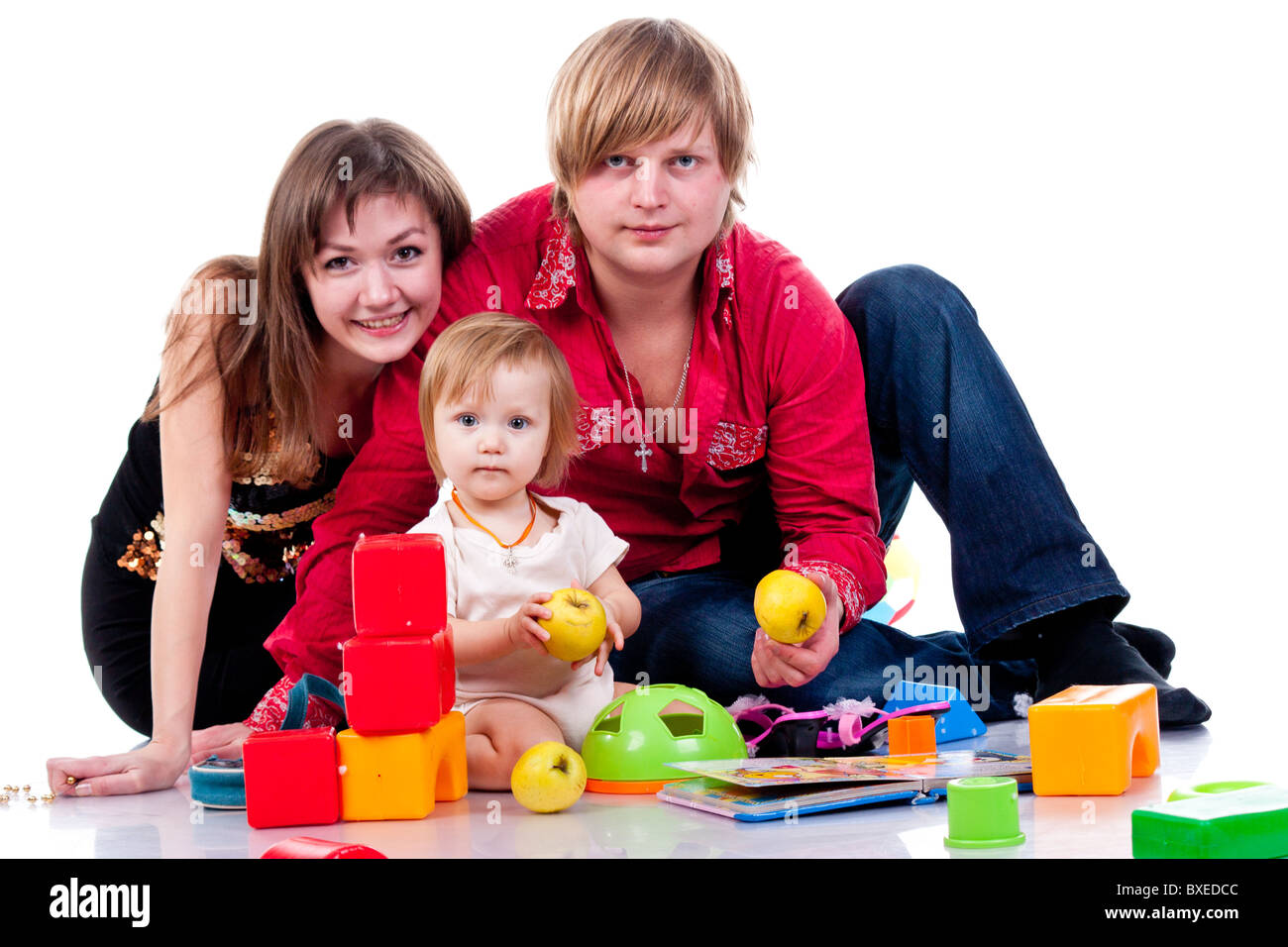 Family playing with toys isolated on white Stock Photo - Alamy