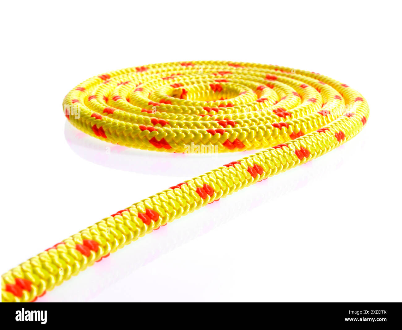Yellow rope in a circular pattern Stock Photo - Alamy