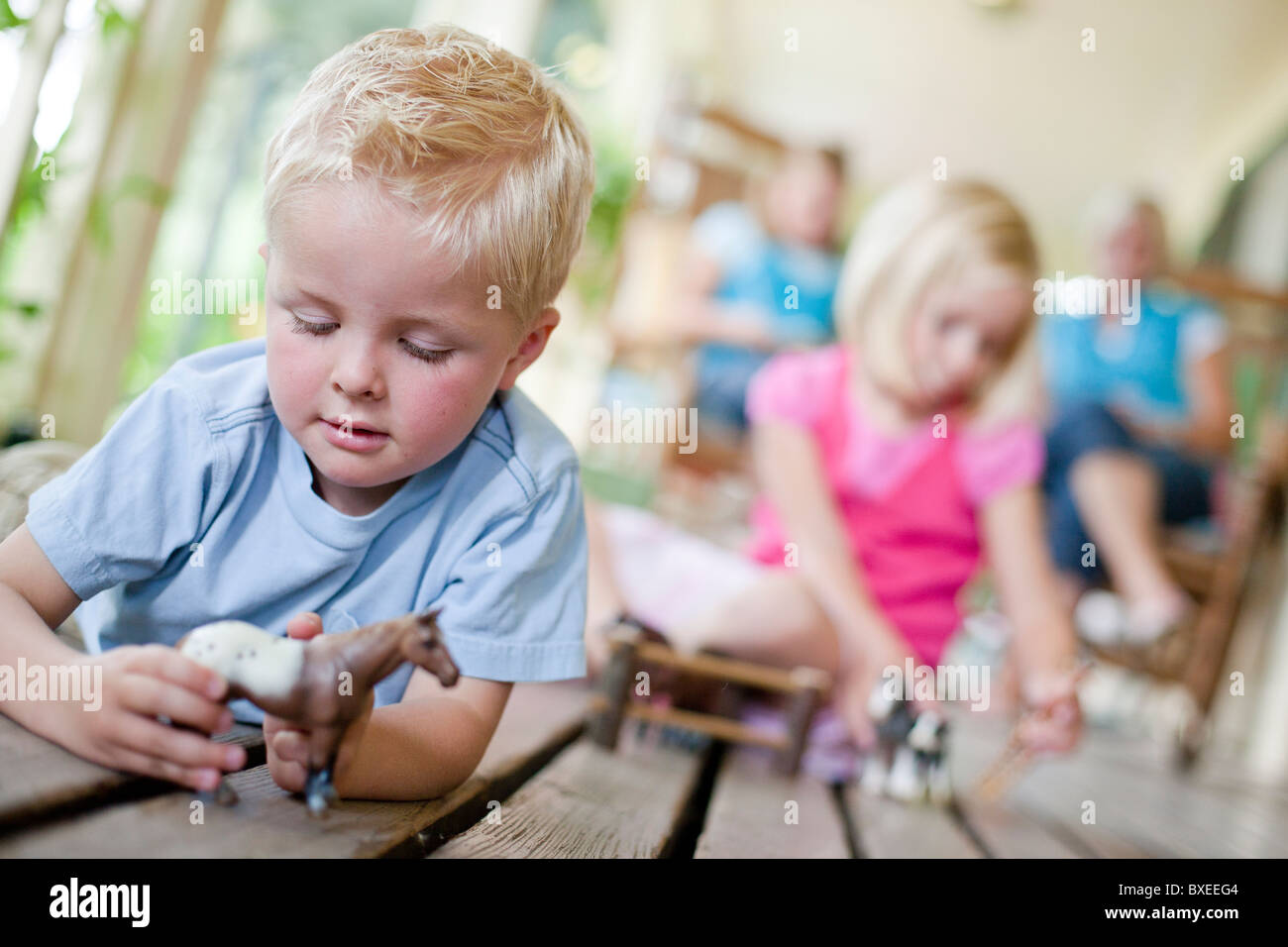 Children playing on porch Stock Photo - Alamy