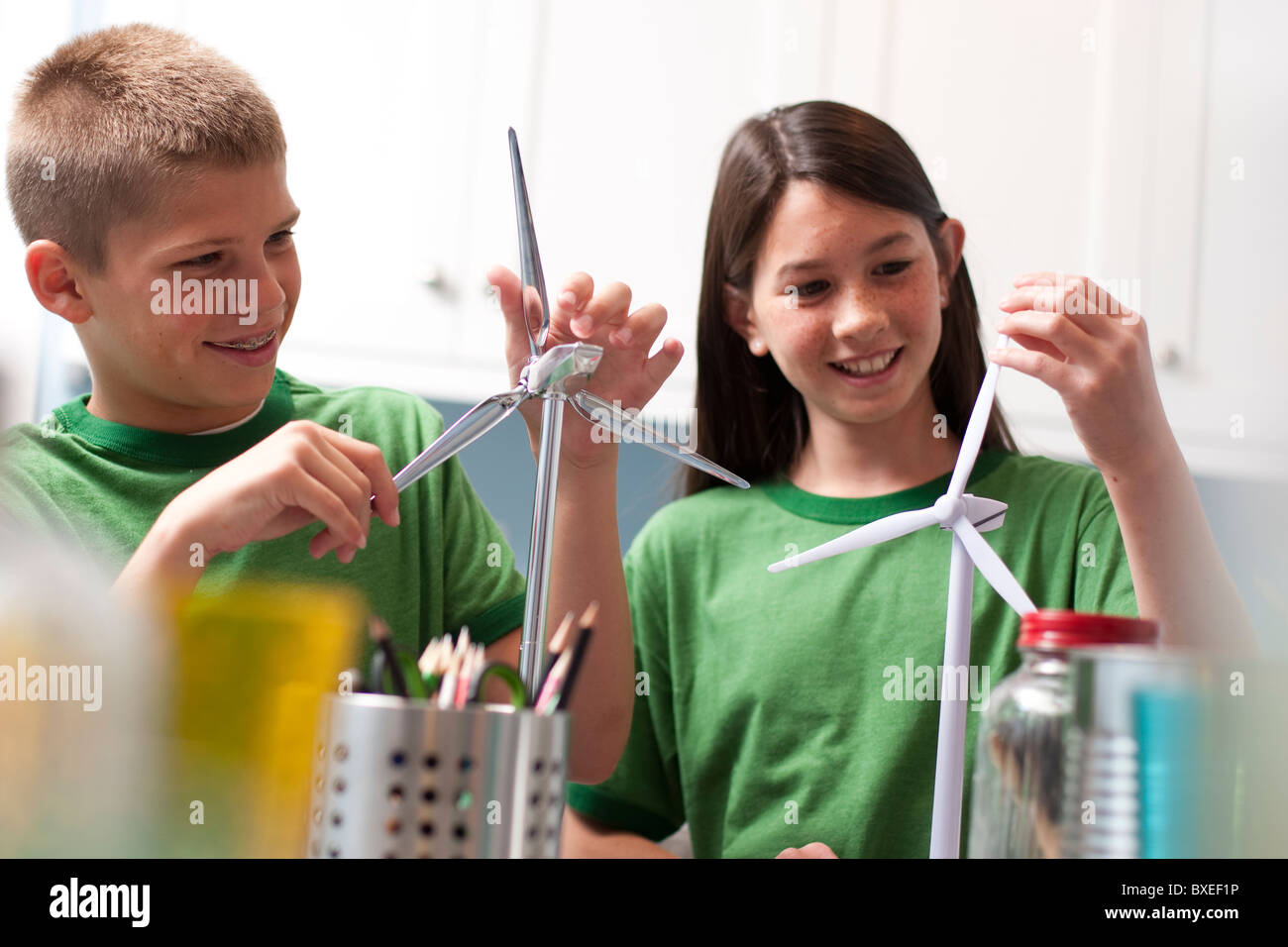Two children making model windmills Stock Photo - Alamy
