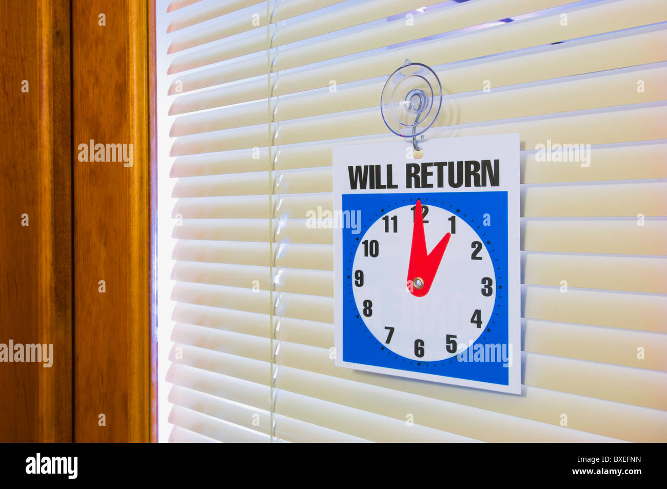 Closed sign on office door Stock Photo - Alamy