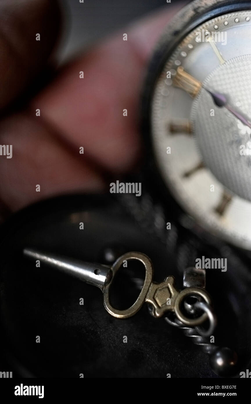 antique watch and winding key Stock Photo - Alamy
