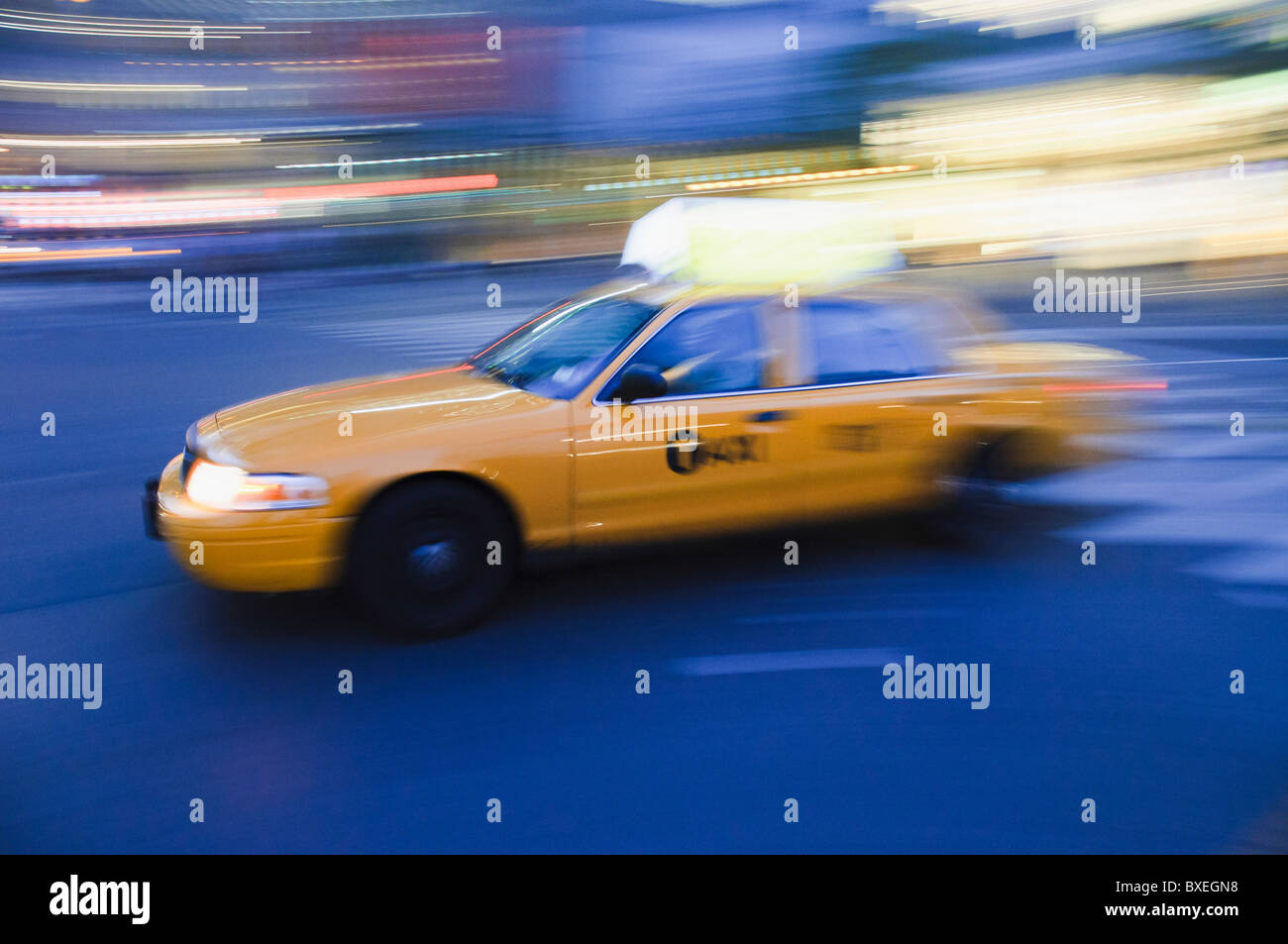 Taxi cab driving at night Stock Photo - Alamy
