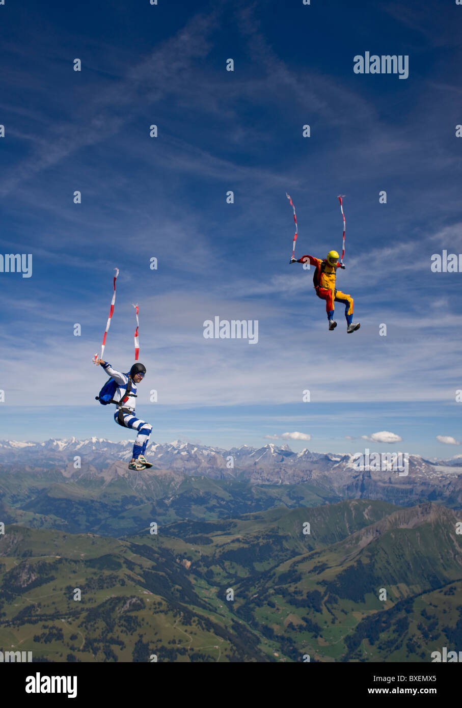 Freefly skydiving team is training sit flying with streamers over a ...
