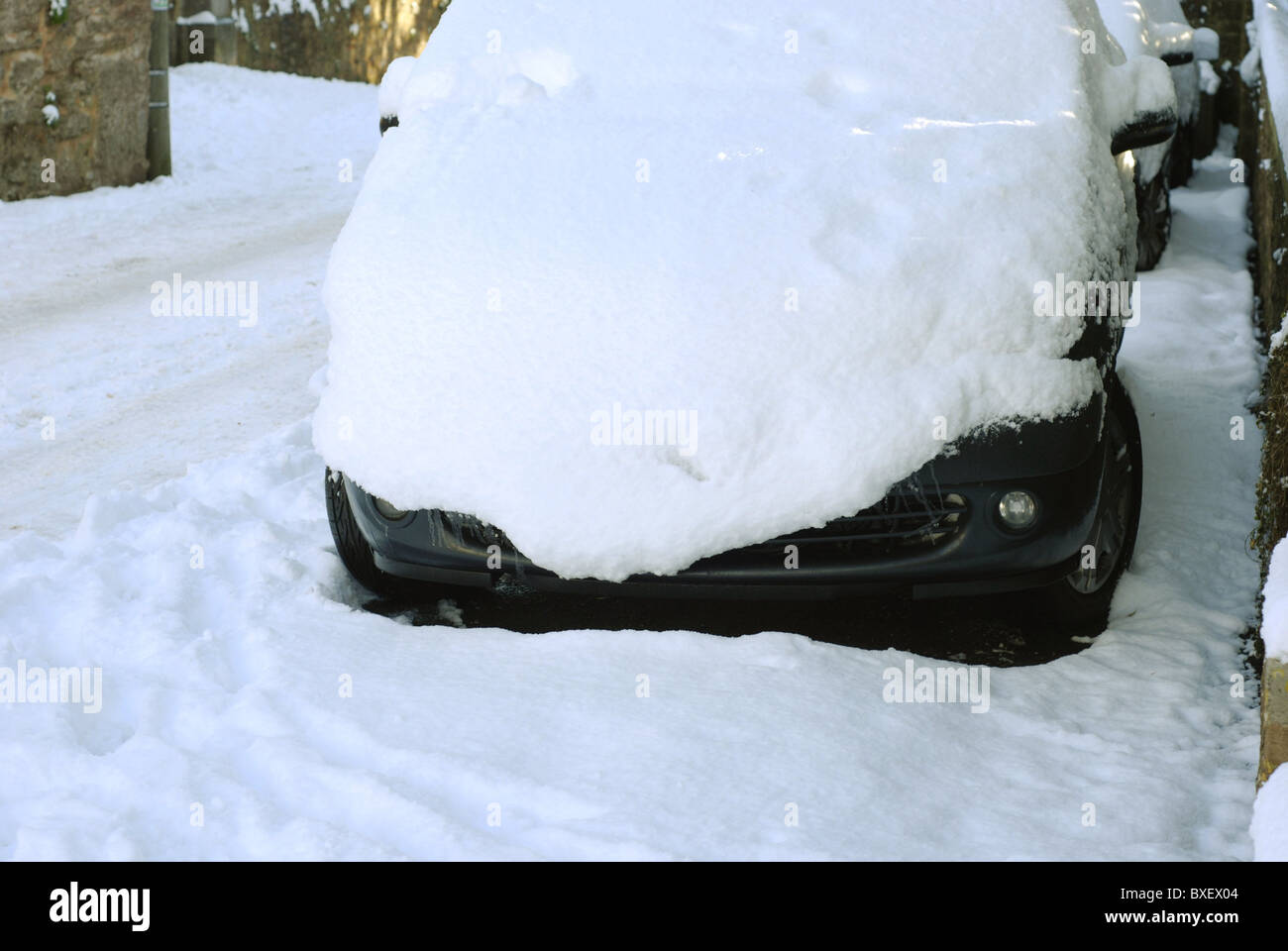 Car covered in snow after heavy snowfall Stock Photo - Alamy