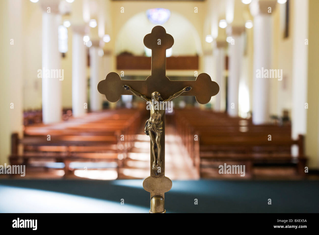 Crucifix on altar at St. Lawrence's Catholic church in Feltham, London ...