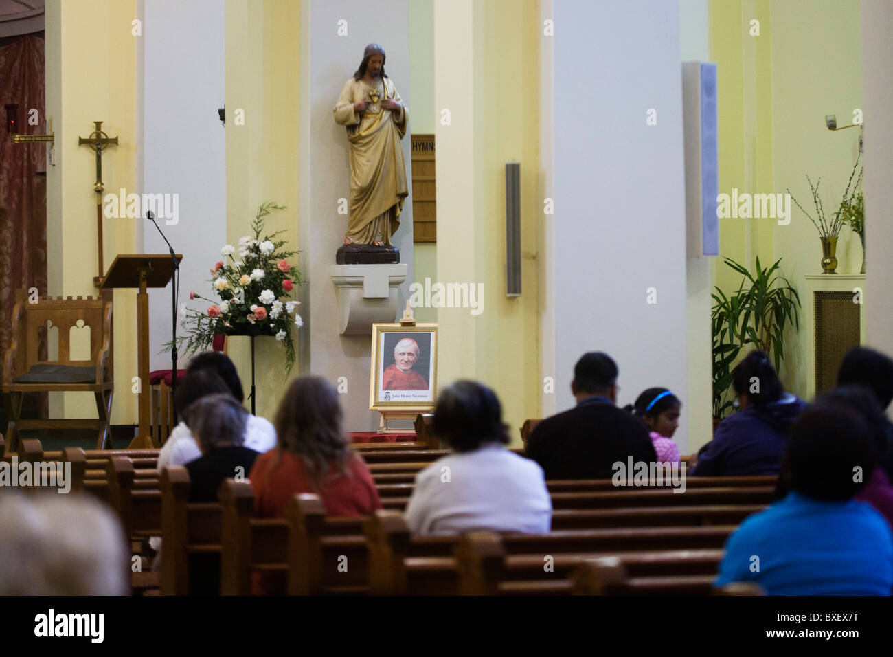 Priest gives blessings during daily Mass at St. Lawrence's Catholic ...