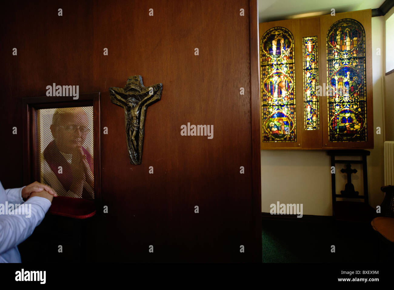 Confessional between penitent and priest at St. Lawrence's Catholic ...