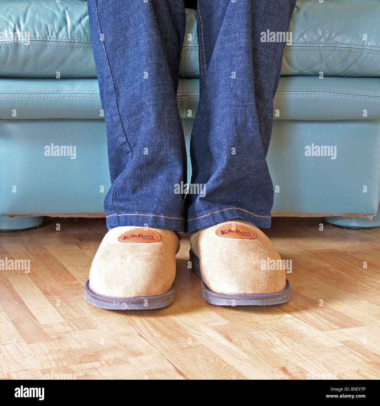 Mens feet in slippers hi-res stock photography and images - Alamy