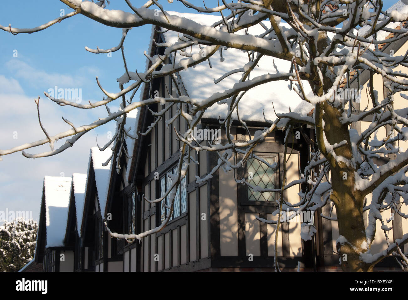Snow covered timber frame houses Stock Photo - Alamy