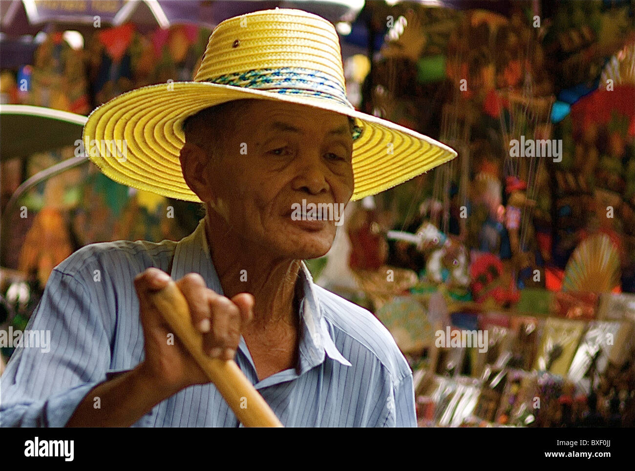 old man floating market thailand Stock Photo - Alamy