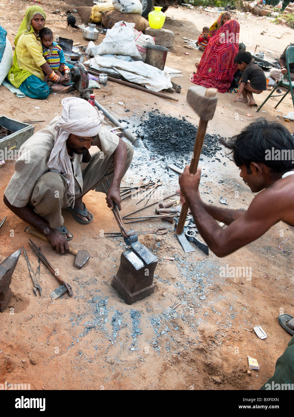 Beating metal using a hammer hi-res stock photography and images - Alamy