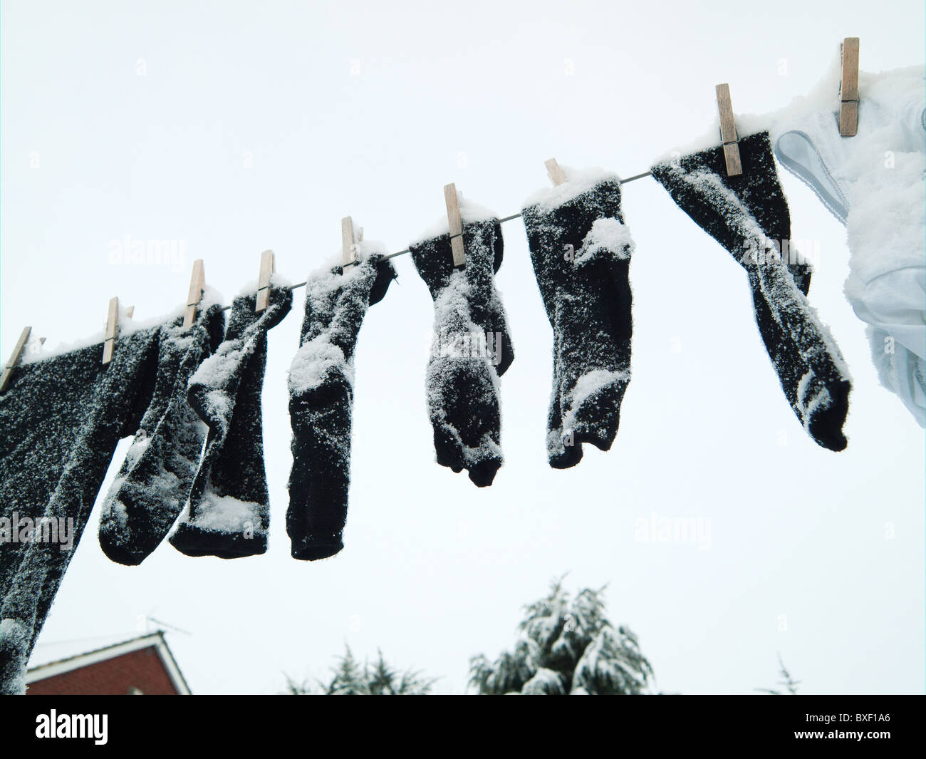 Washing line snow hi-res stock photography and images - Alamy