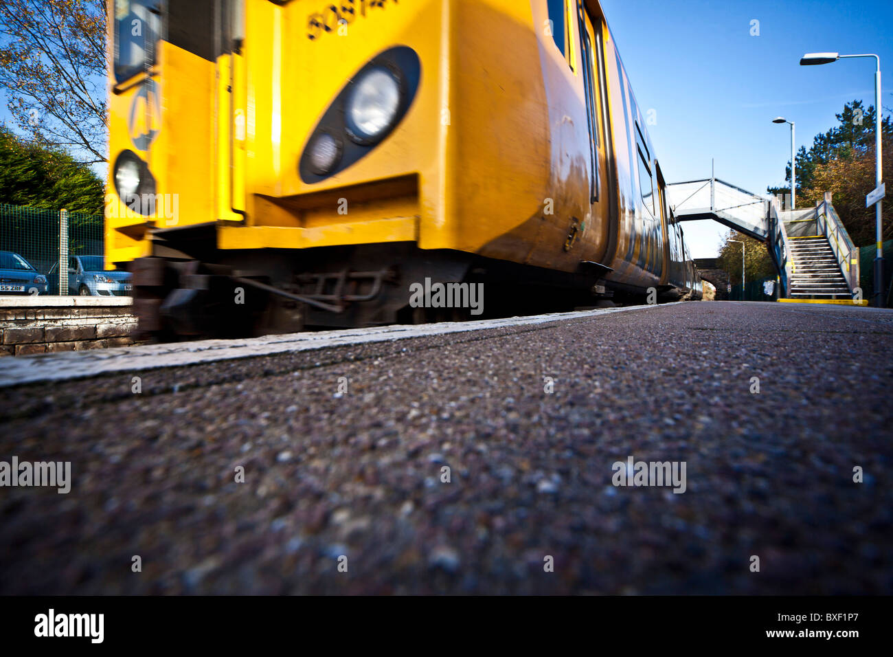 Train at the railway station Stock Photo - Alamy
