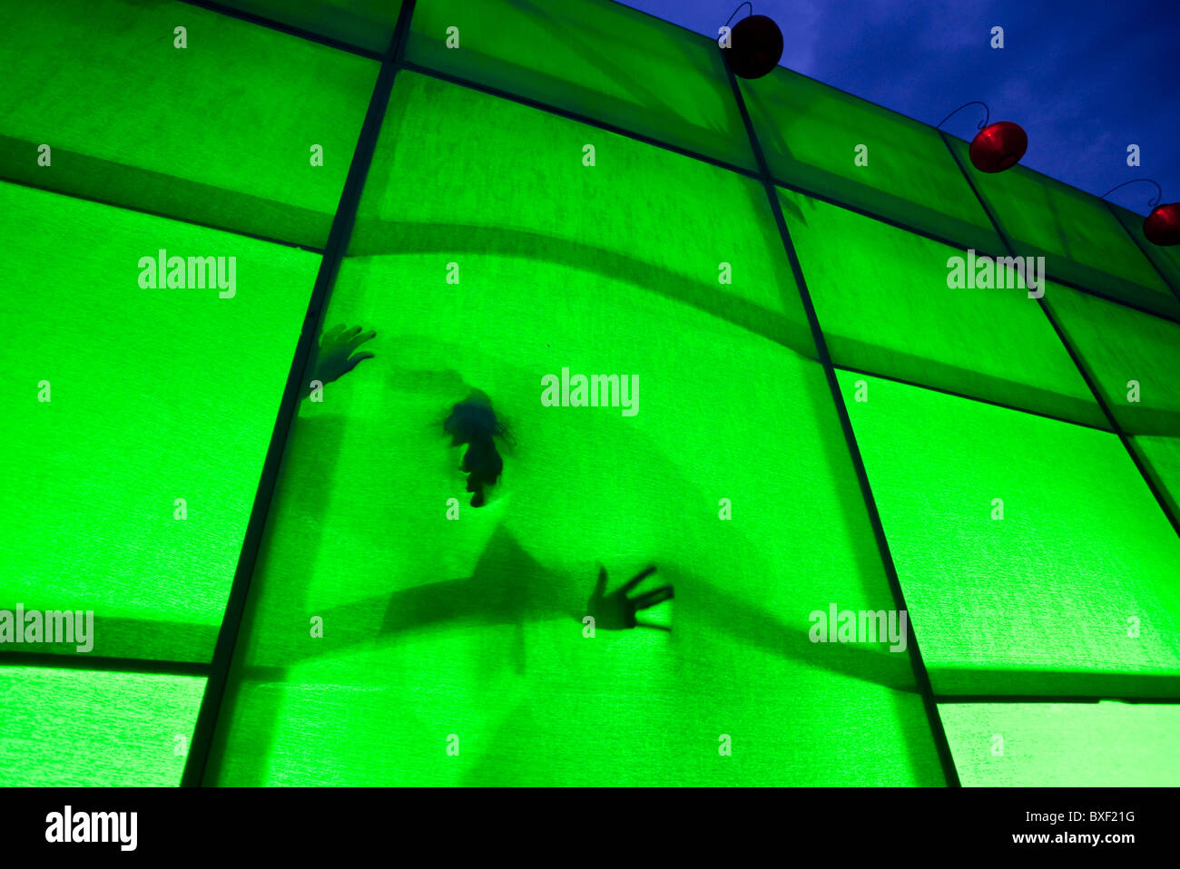 Abstract image of woman trapped behind screen Stock Photo - Alamy