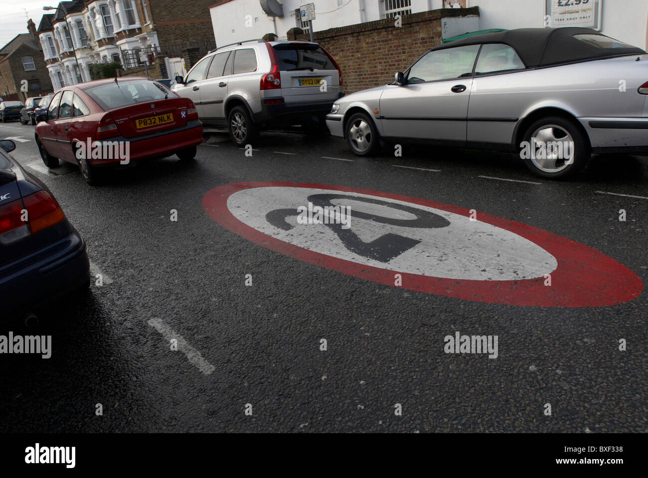 Speed limit road marking in a suburban street London UK Stock Photo - Alamy