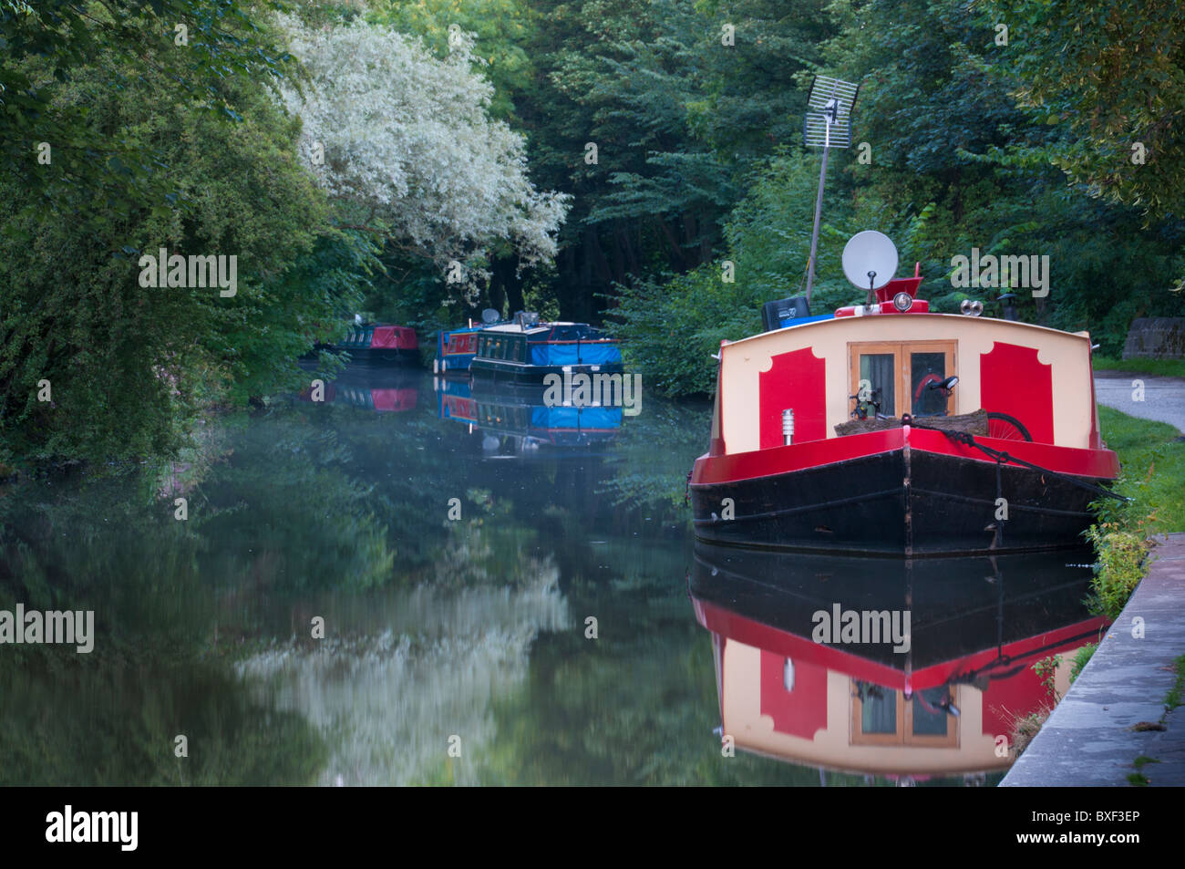 Barges on the Leeds Liverpool Canal at Saltaire Stock Photo - Alamy