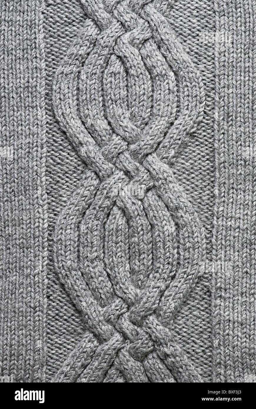 Grey knitting background of handmade woolen pattern Stock Photo - Alamy
