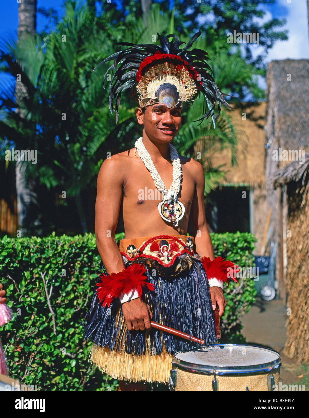 Hawaiian dancer playing drums, Kodak Hula Show, Honolulu, Oahu, Hawaii ...
