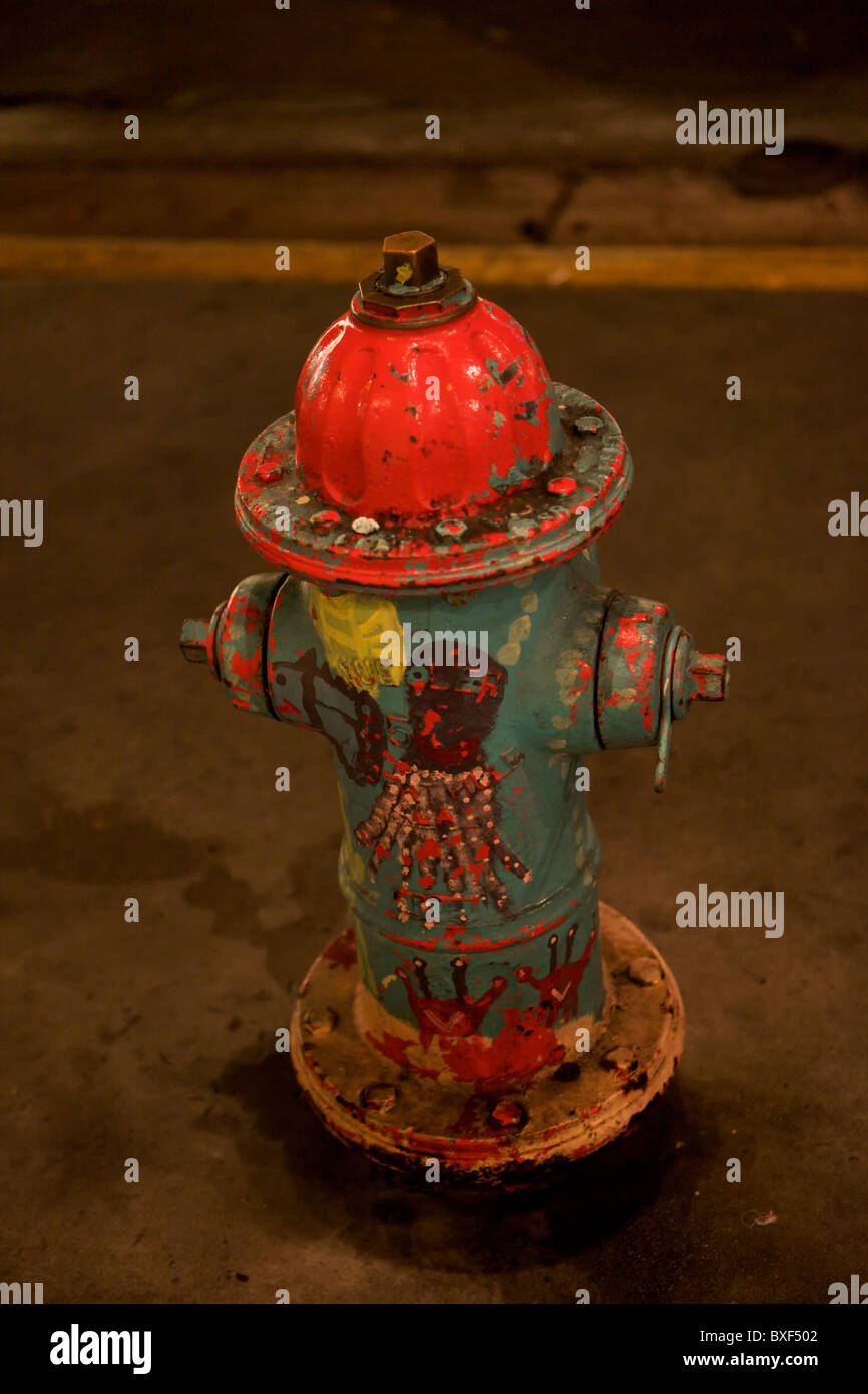 fire hydrant with graffiti Stock Photo - Alamy