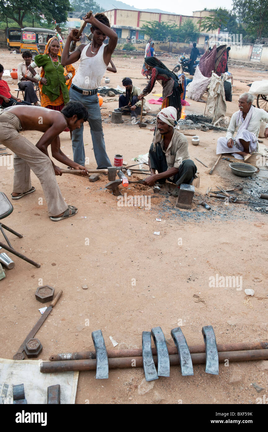 Gadia Lohar. Nomadic Rajasthan men forging metal axe heads. India's ...