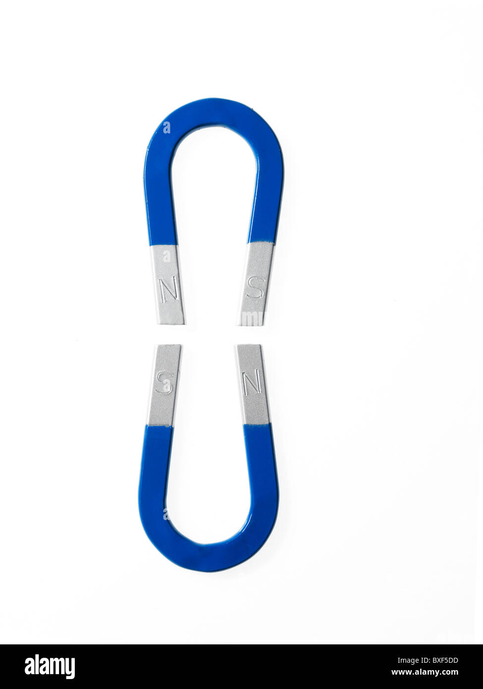 Two blue magnets Stock Photo - Alamy