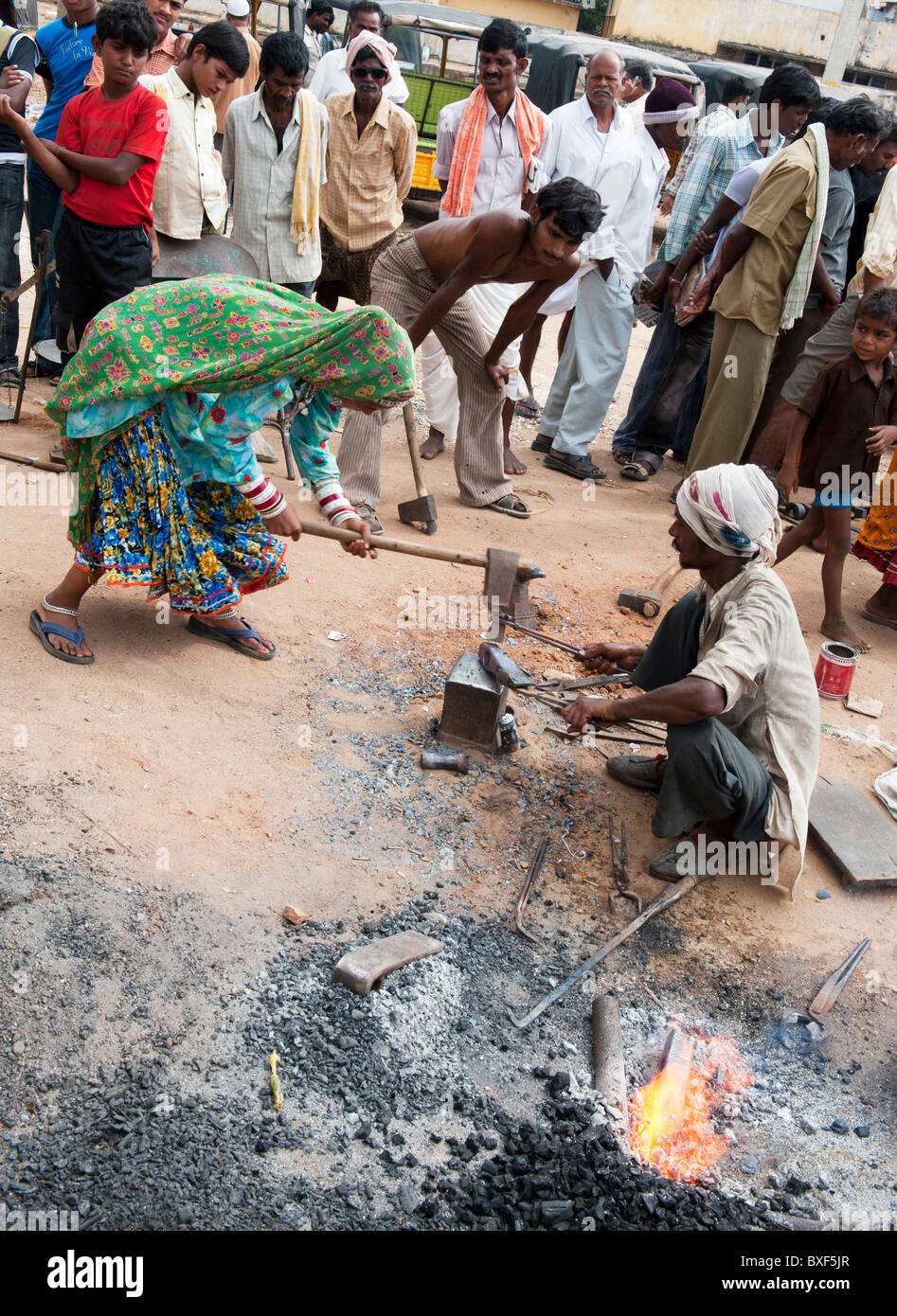 Woman blacksmith working in forge hi-res stock photography and images ...