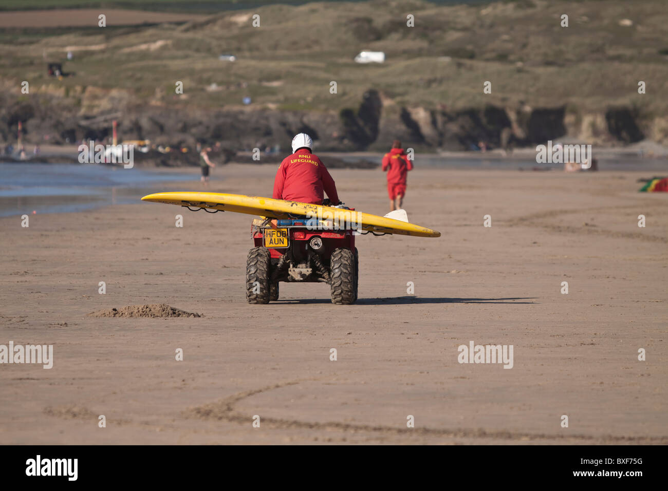 Lifeguards patrolling a Cornish beach Stock Photo - Alamy