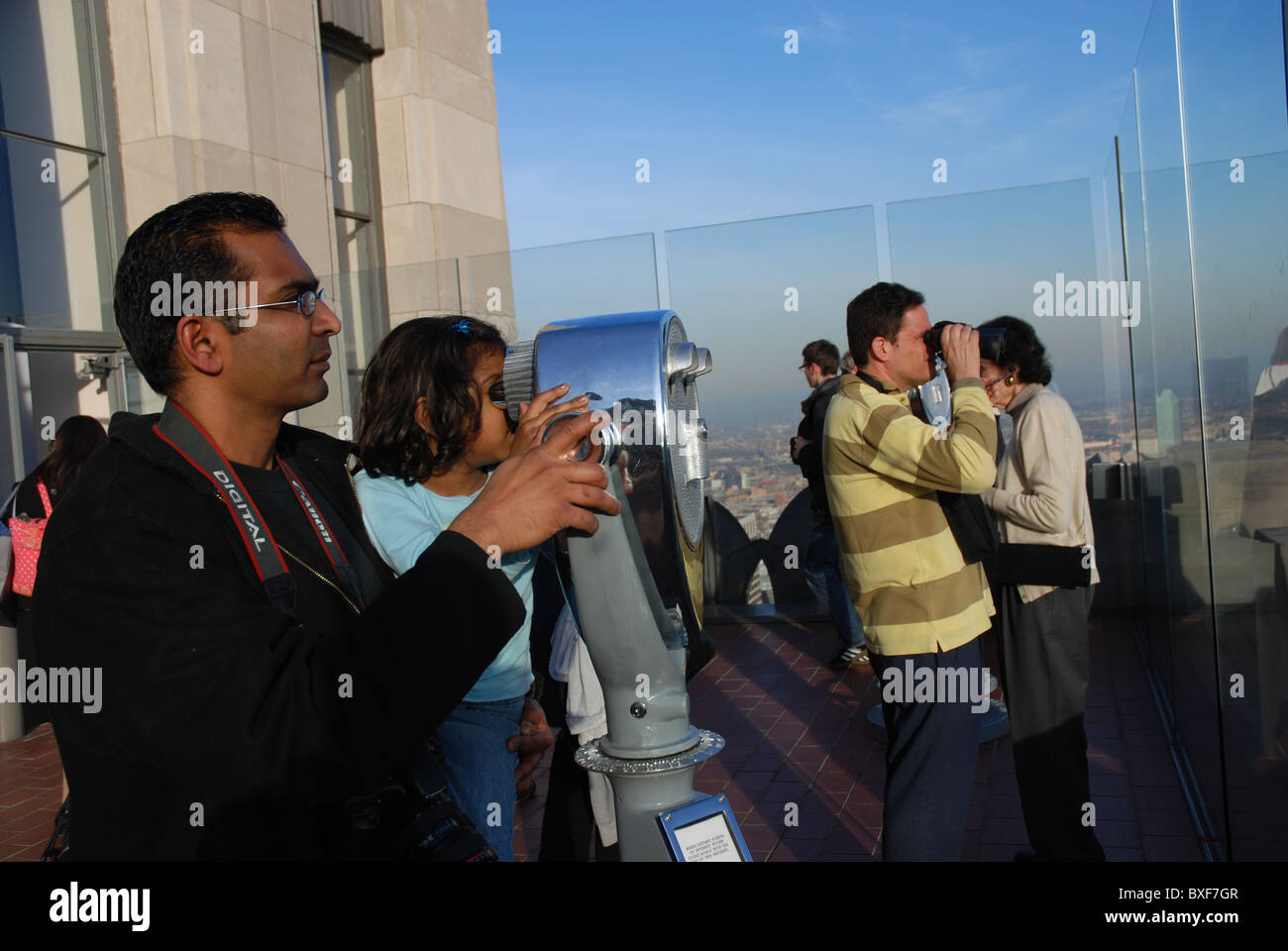 A Father with his young Boy have a view from the Rockefeller Center in ...