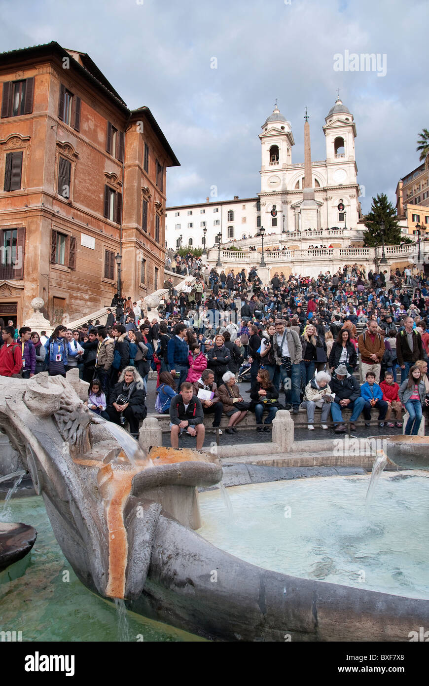 Piazza di Spagna in front of the Spanish steps that are crowded with ...